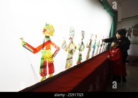 Children experience the shadow puppet play in Tangshan City, north ...
