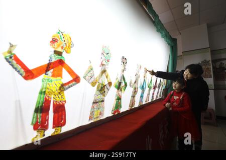Children experience the shadow puppet play in Tangshan City, north ...