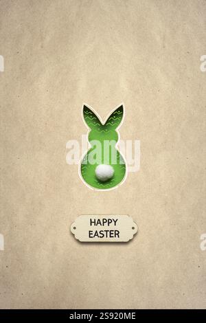 Creative Easter concept photo of a rabbit with paper eggs on a white ...