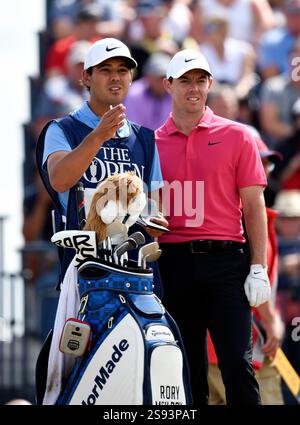 Rory McIlroy speaks with his caddie Harry Diamond on the 5th hole ...