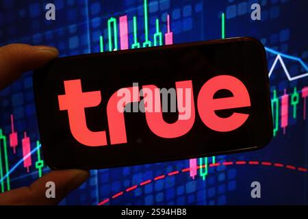 In this photo illustration, the True Corporation company logo is seen ...