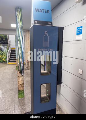 Modern water fountain with bottle refill station in an interior design ...