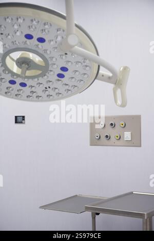Modern Surgical Light and Tables in Medical Facility Stock Photo - Alamy