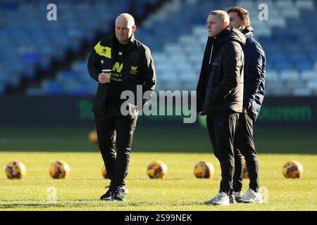 Millwall manager Alex Neil (left) and Swansea City manager Vitor Matos ...
