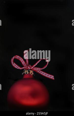 Colored christmas decorations on black wooden table. Xmas balls on ...