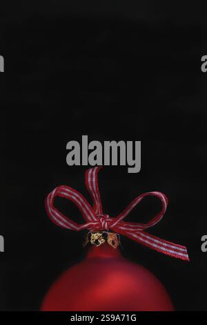 Colored christmas decorations on black wooden table. Xmas balls on ...