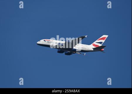 A British Airways A380 aircraft is seen flying through the clouds ...