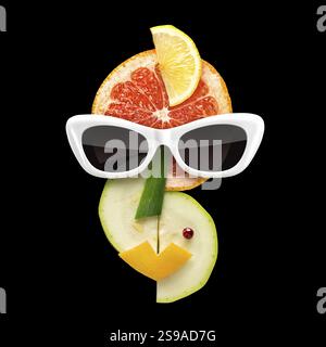 Quirky food concept of Picasso style female face in sunglasses made of ...