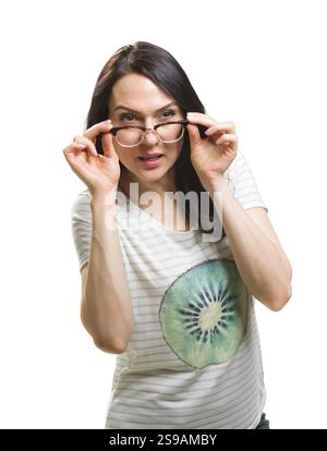 Woman with raised glasses cannot see, against a white background Stock ...