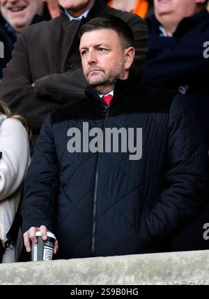 Arsenal managing director Richard Garlick celebrates on the pitch ...