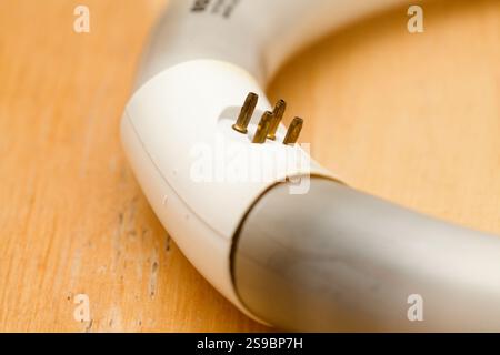 Circular fluorescent tube burned out and blackened at the cathodes ...