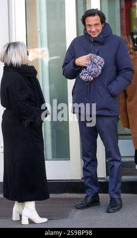 Gianluca Torre leaves Radio 105 with a friend Stock Photo - Alamy