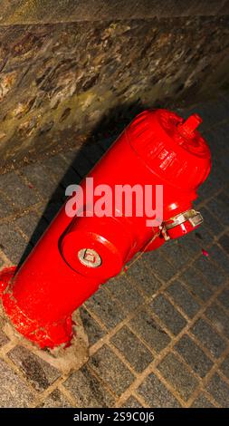 Front view, medium distance of a red fire water hydrant Stock Photo - Alamy
