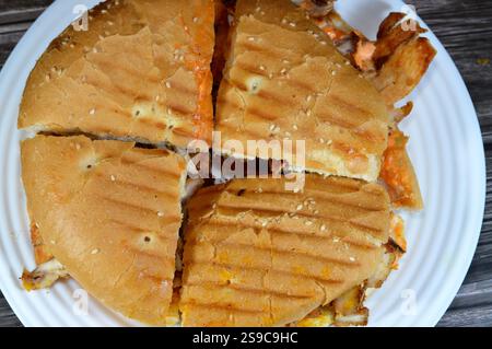 four quarters of a Syrian Maria shawarma chicken pie, Chicken Shawarma ...