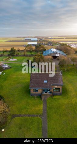 Aerial view of buildings surrounded by fresh greenery Stock Photo - Alamy