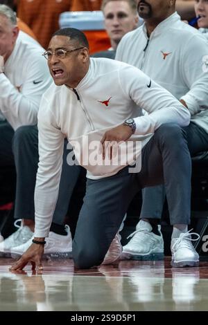 Texas head coach Rodney Terry watches his team warm up against Kentucky ...
