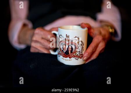 Holocaust survivor Susan Pollack drinks tea from a commemorative Prince ...