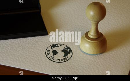 Save the planet stamp and stamping hand. World environment protection ...