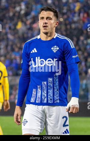 Marc-Oliver Kempf of Como 1907 and Paulo Dybala of AS Roma compete for ...