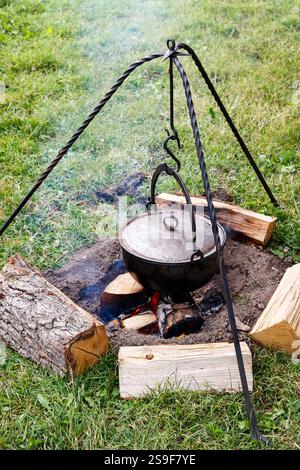 Medieval campfire on grass, historical object Stock Photo - Alamy