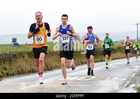 Meltham, Huddersfield, Yorkshire, UK, 26 January 2025. Runners during ...