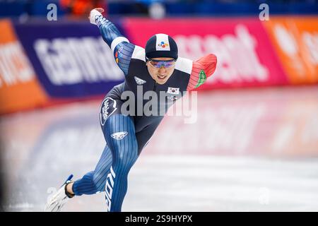 CALGARY, CANADA - JANUARY 26: Jun-Ho Kim of Republic of Korea, Min-Kyu ...