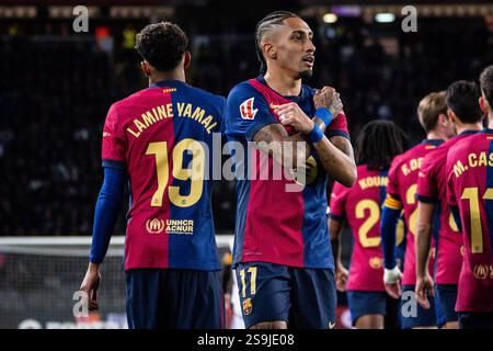 Raphinha Dias Belloli and Lamine Yamal of FC Barcelona gestures during ...