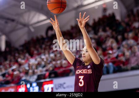 Virginia Tech guard Mackenzie Nelson (3) takes a shot over James ...