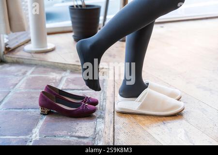 Taking off shoes Stock Photo - Alamy