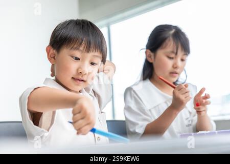 Children engaged in learning Stock Photo - Alamy