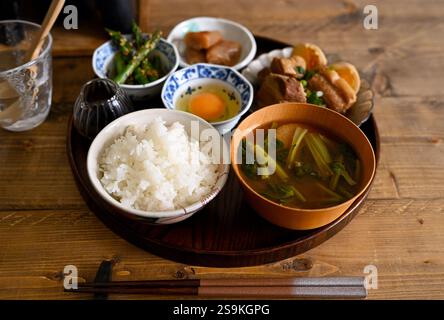 Dining table with simmered pork cubes Stock Photo - Alamy