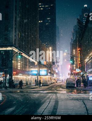 A snowy night in the Theater District, Midtown Manhattan, New York City ...