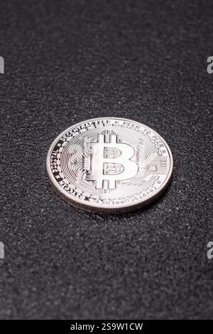 Bitcoin cryptocurrency dummy in the form of a round iron coin ...