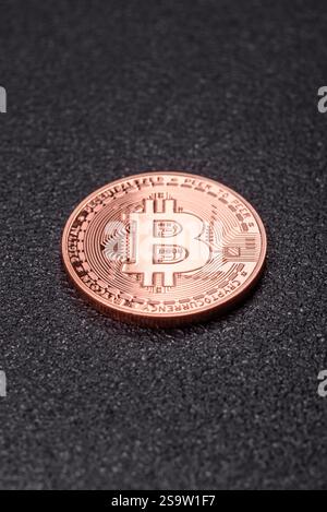 Bitcoin cryptocurrency dummy in the form of a round iron coin ...