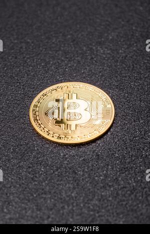 Bitcoin cryptocurrency dummy in the form of a round iron coin ...