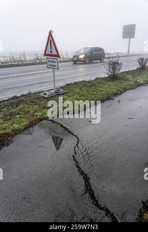 severe road damage and damage to the pavement, traffic infrastructure ...