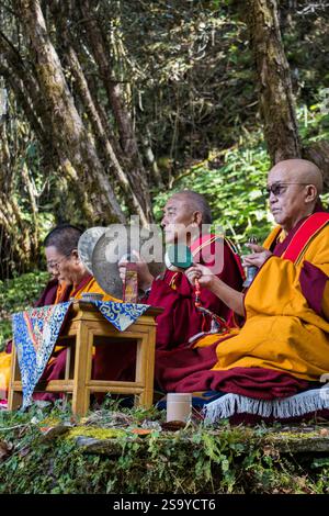 Sang Sang Rimpoche conducts puja at the spring below Chiwong Monastery ...