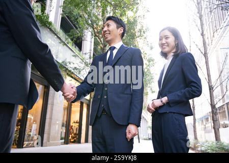 Business scene - handshake Stock Photo - Alamy