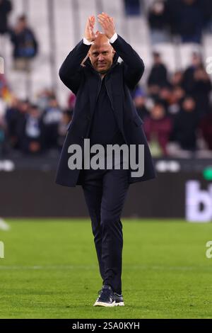 Liverpool manager Arne Slot celebrates with the Premier League trophy ...