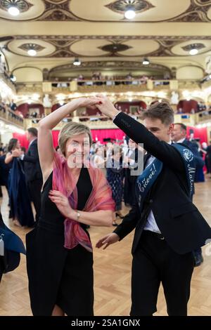 Mother dancing with son on traditional graduate ball in Prague's famous ...
