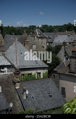 Lauze (slate) roofs in the village of Salers in the Cantal, typical of ...