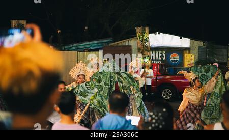 Students in vibrant costumes join the lively Dinagyang Festival parade ...