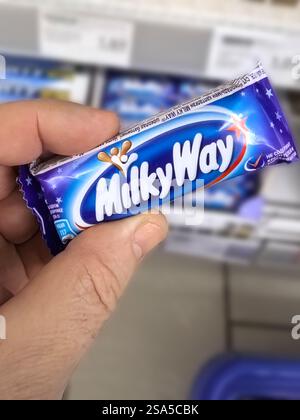 Milky Way candy bar with wrapper opened Stock Photo - Alamy