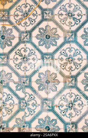 Detail of the traditional tiles from facade of old house. Decorative ...