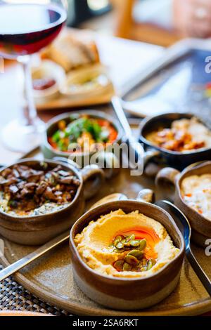 Selection of traditional turkish appetizers including hummus with ...