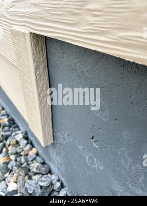 Exterior House Siding and Foundation Gap Stock Photo - Alamy