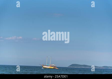 Tourist boat on the coast of Gamboa beach, Santa Catarina, Brazil.NEF ...