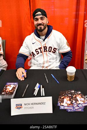 Houston Astros pitcher Nick Hernandez (72) hands the ball to manager ...