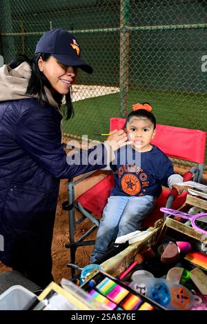 Fans enjoying time on the field during the 2025 Houston Astros FanFest ...