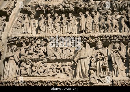 Gothic sculpture above the door of medieval Amiens Cathedral, Amiens ...